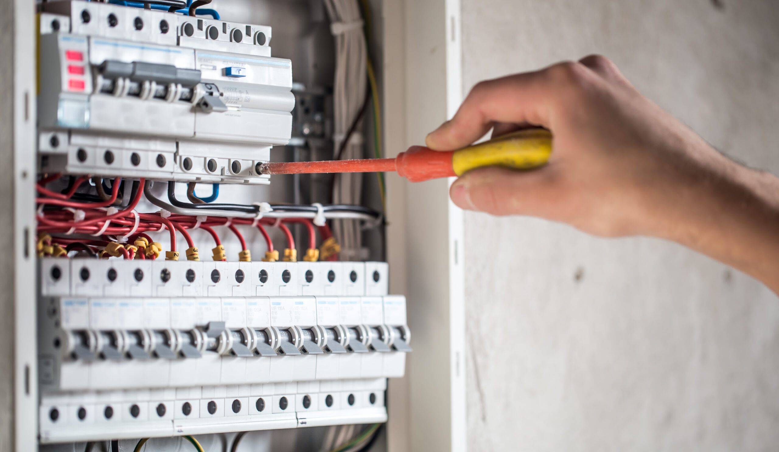man-electrical-technician-working-switchboard-with-fuses-installation ...